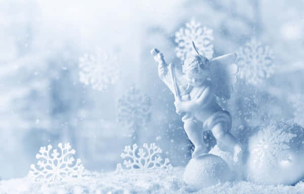 Download Young Woman Making a Snow Angel in Winter Wonderland Wallpaper ...