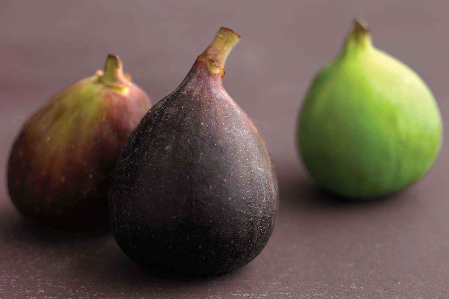 Download Three Figs Variety Colors Wallpaper | Wallpapers.com