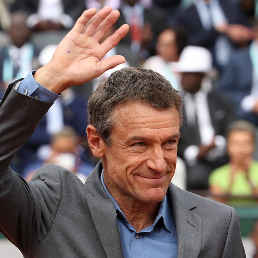 Download Old Mats Wilander Waving Wallpaper | Wallpapers.com